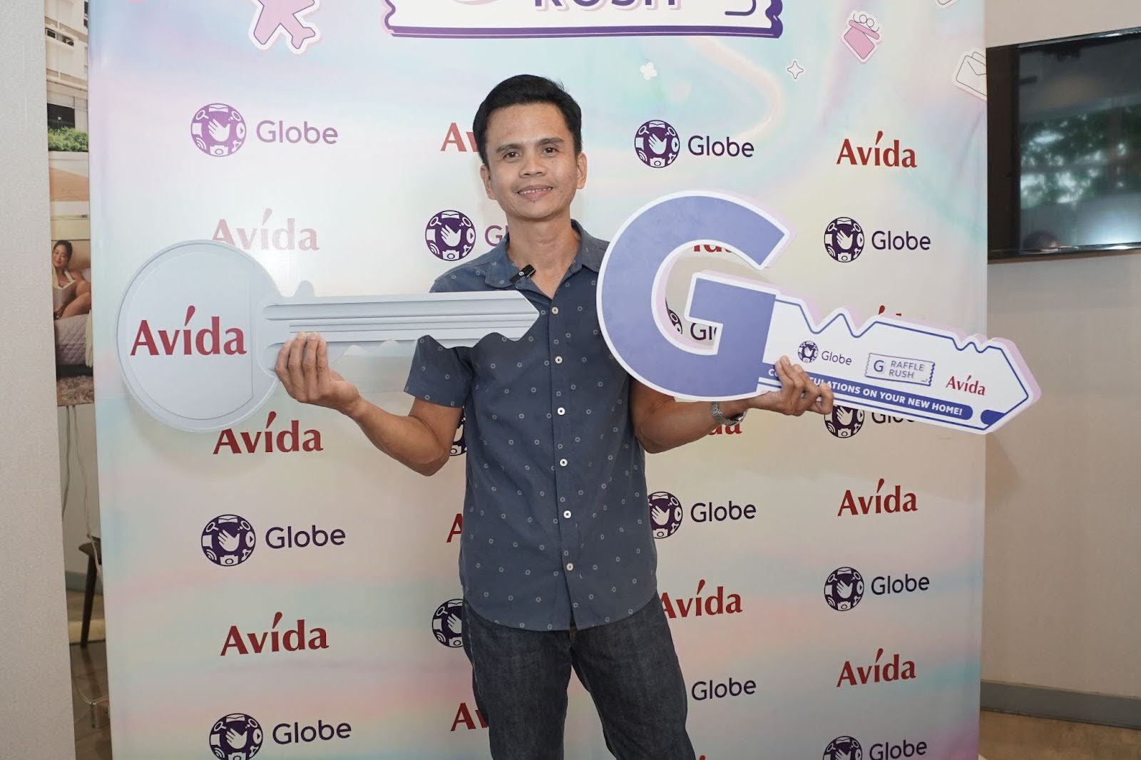 Trike driver wins condo in Globe’s G Raffle Rush - Manila Insight